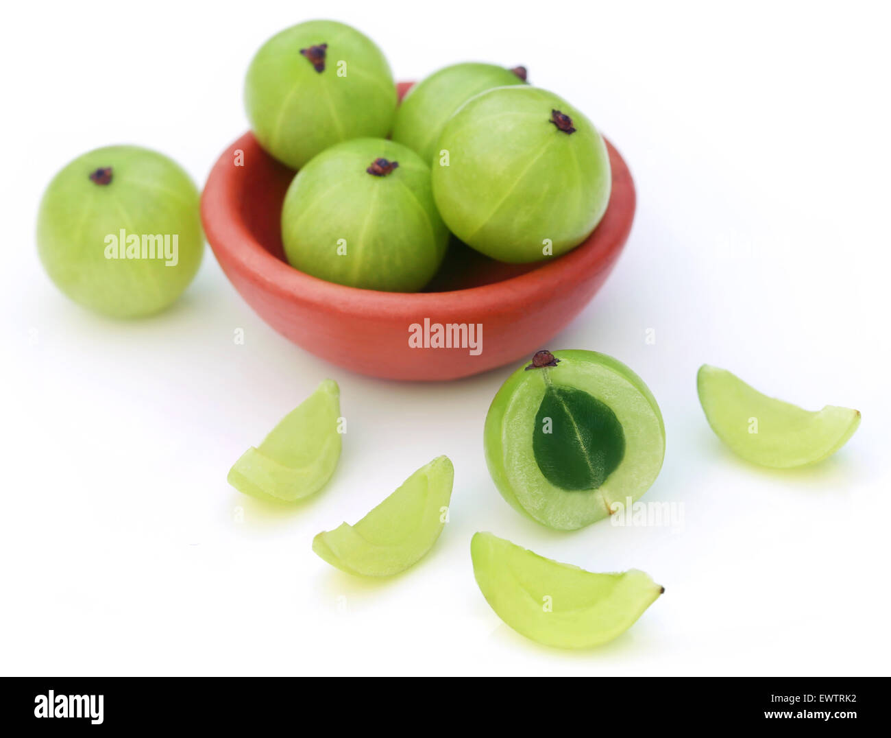 Fresh amla over white background Stock Photo - Alamy