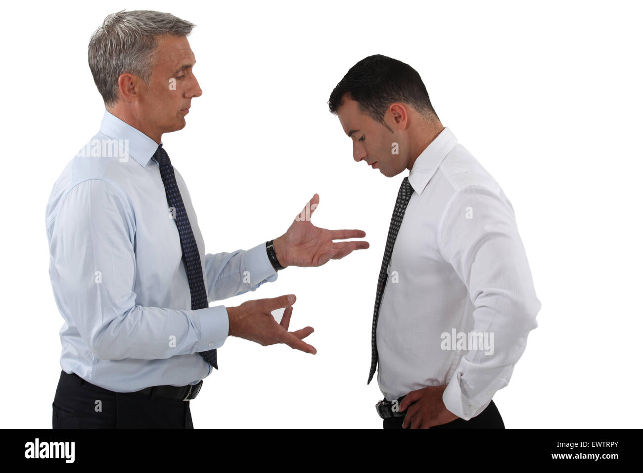 Boss telling-of employee Stock Photo - Alamy