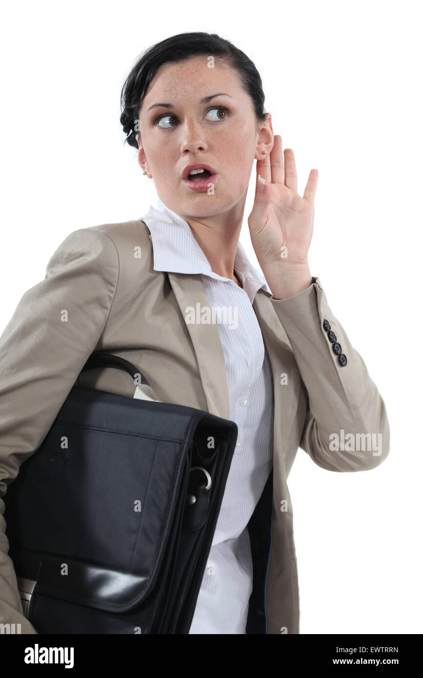 Woman straining ear hi-res stock photography and images - Alamy