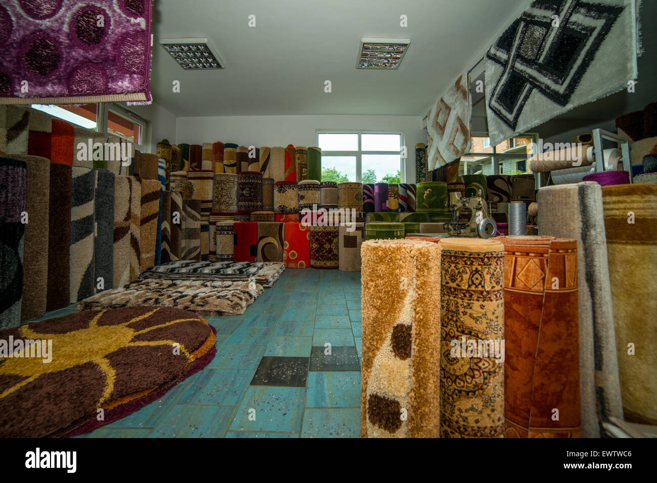 Carpets And Rugs Rolled Up & Displayed Stock Photo - Alamy