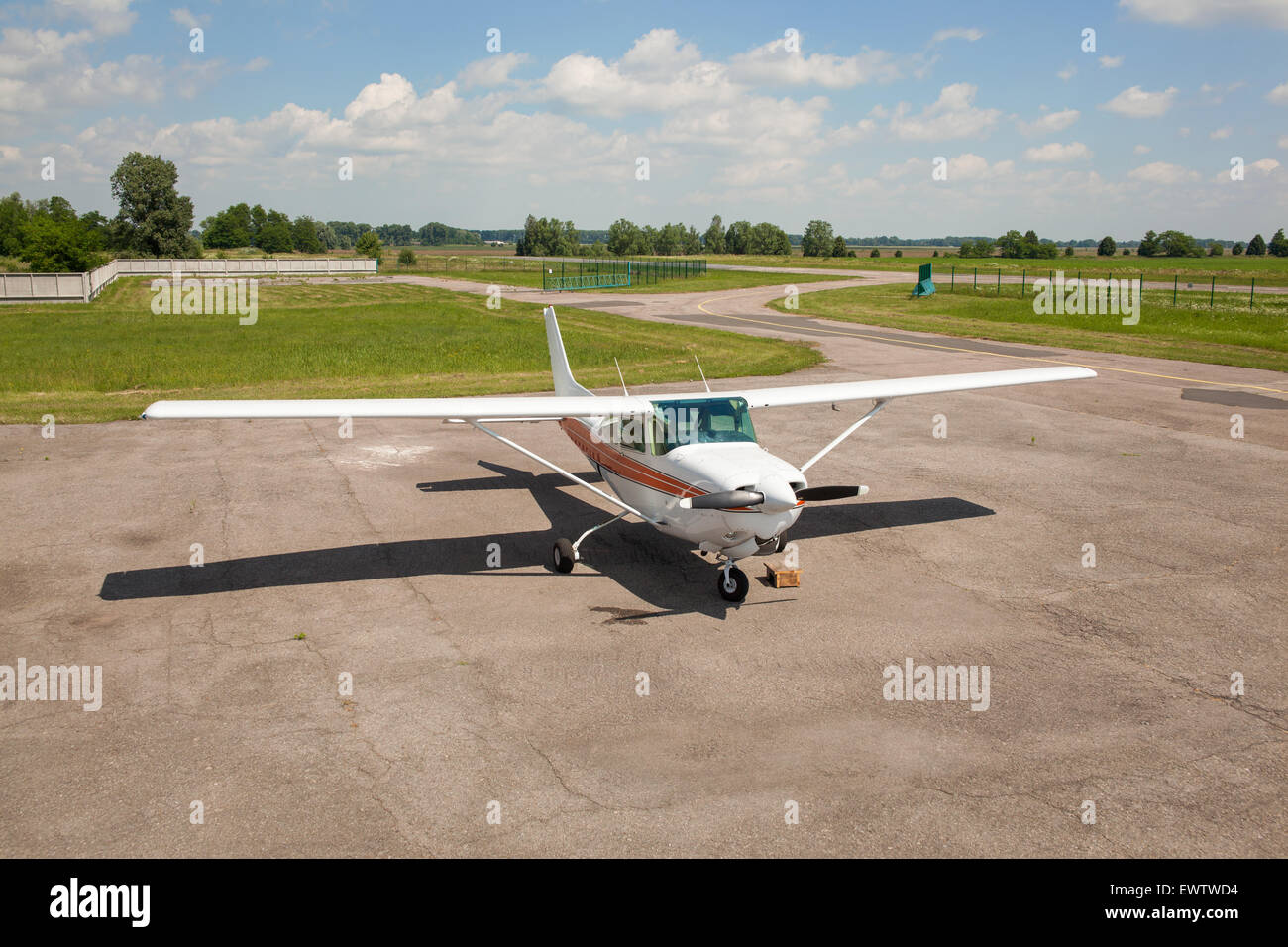 Light plane parked on the private airfield Stock Photo - Alamy
