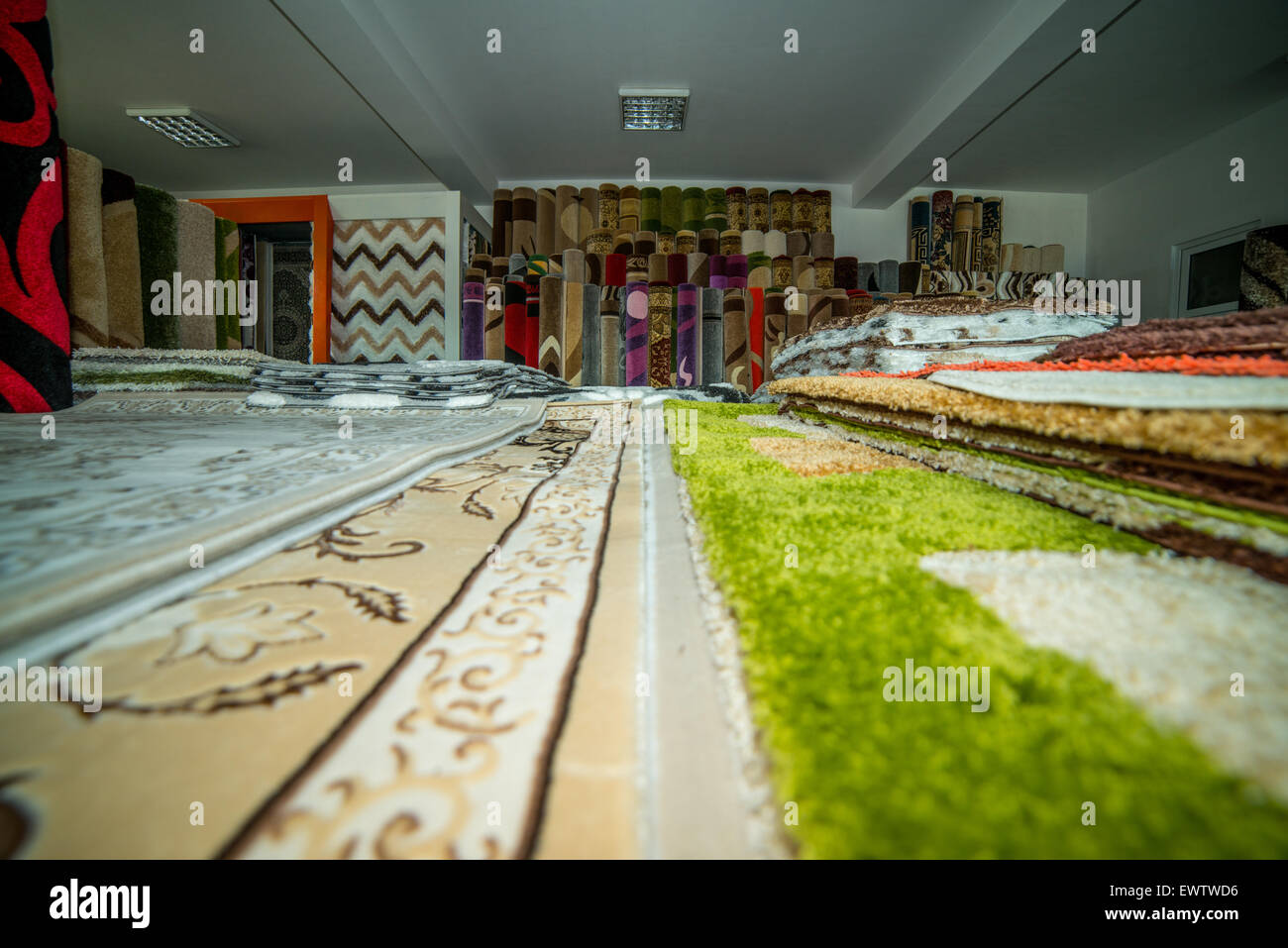 Carpets And Rugs Rolled Up & Displayed Stock Photo - Alamy