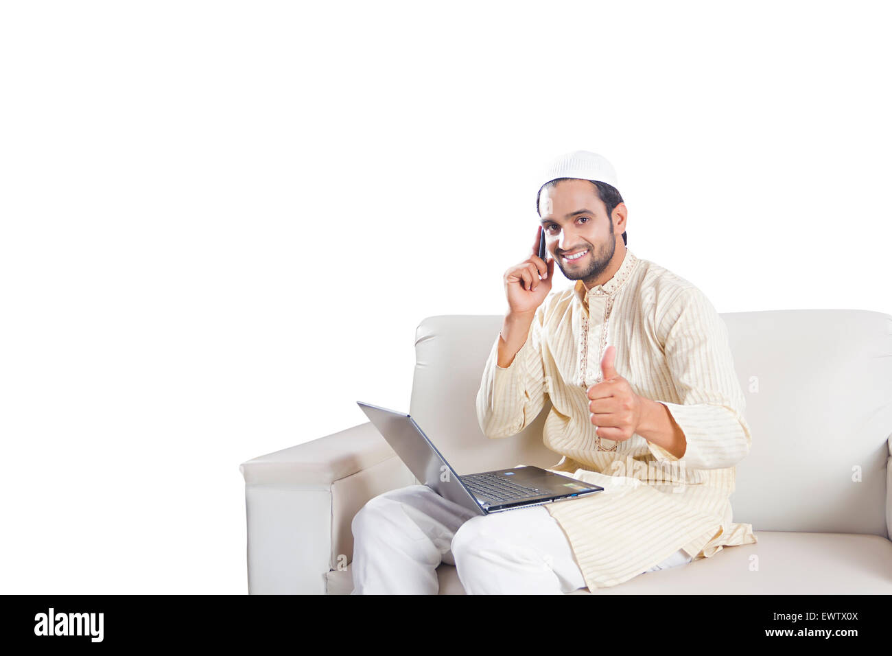 1 indian Muslim Man laptop and talking Cell Phone Stock Photo - Alamy
