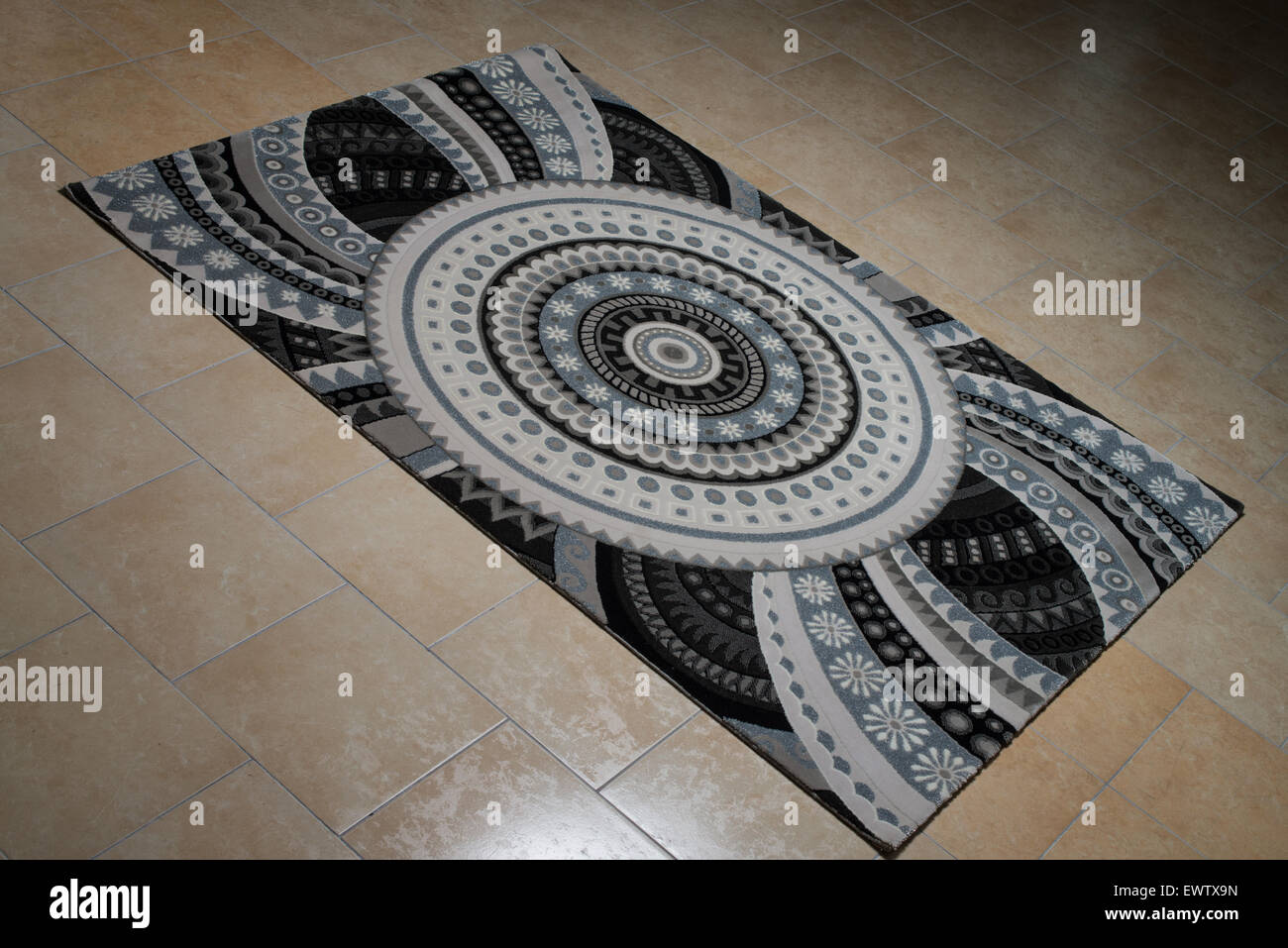 Pattern Carpet Lying On Floor Stock Photo - Alamy