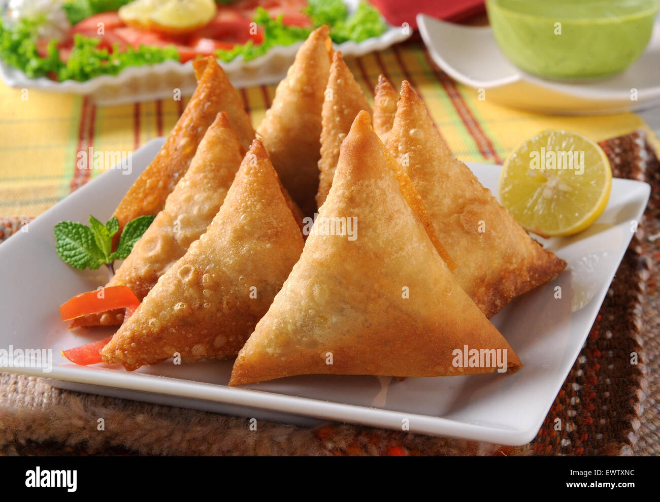 Samosa in White Dish Stock Photo - Alamy