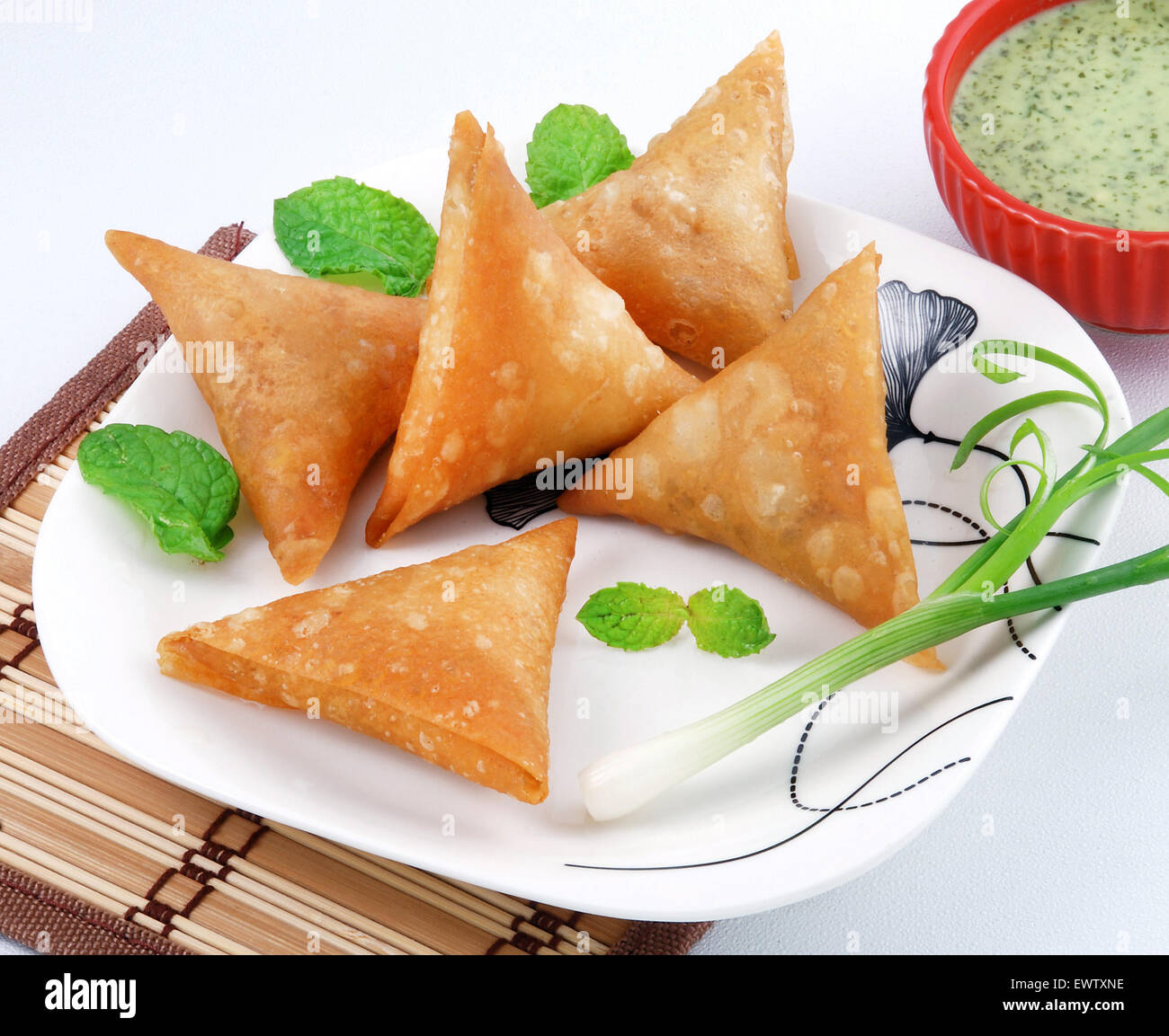 Samosa in White Dish Stock Photo - Alamy