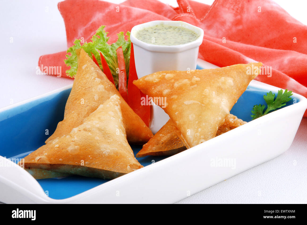 Samosa in White Dish Stock Photo - Alamy