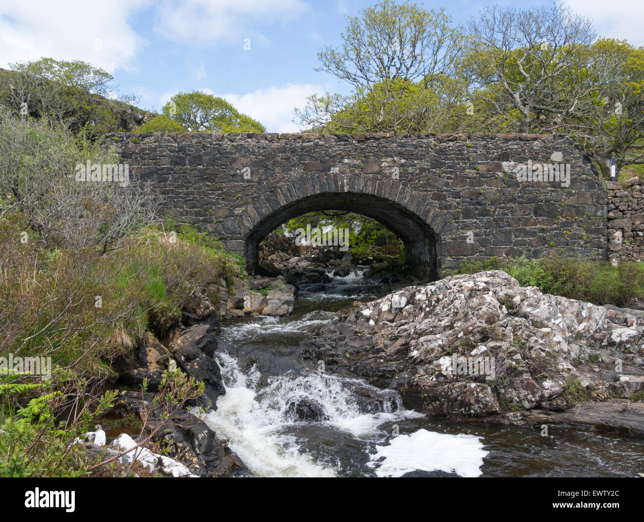 Waterfall flowing under road bridge hi-res stock photography and images ...