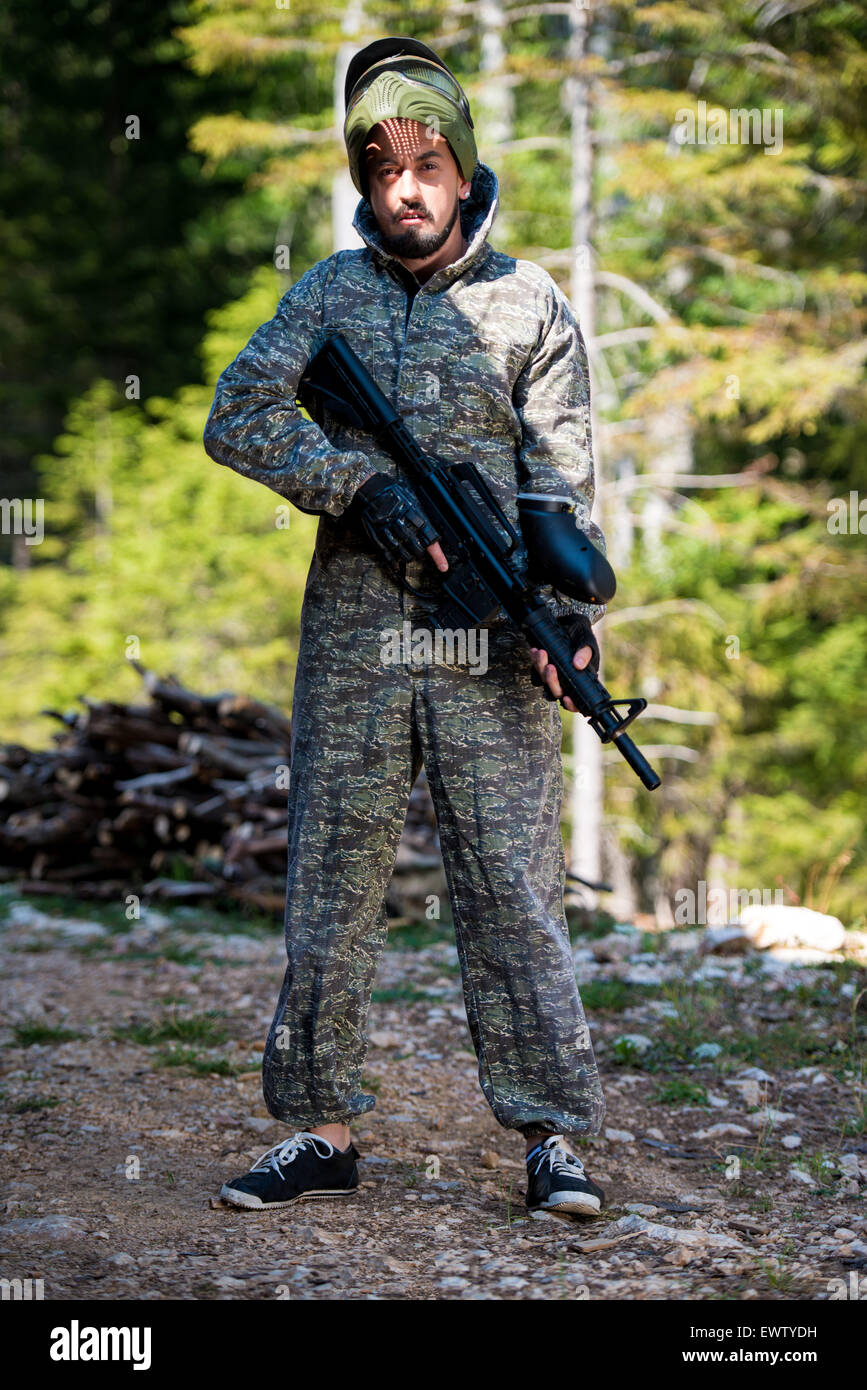 Paintball player posing for camera Stock Photo - Alamy