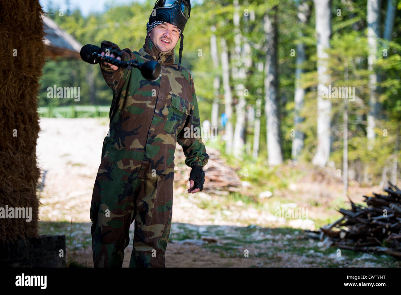 Players in paintball prepare for fight Stock Photo - Alamy