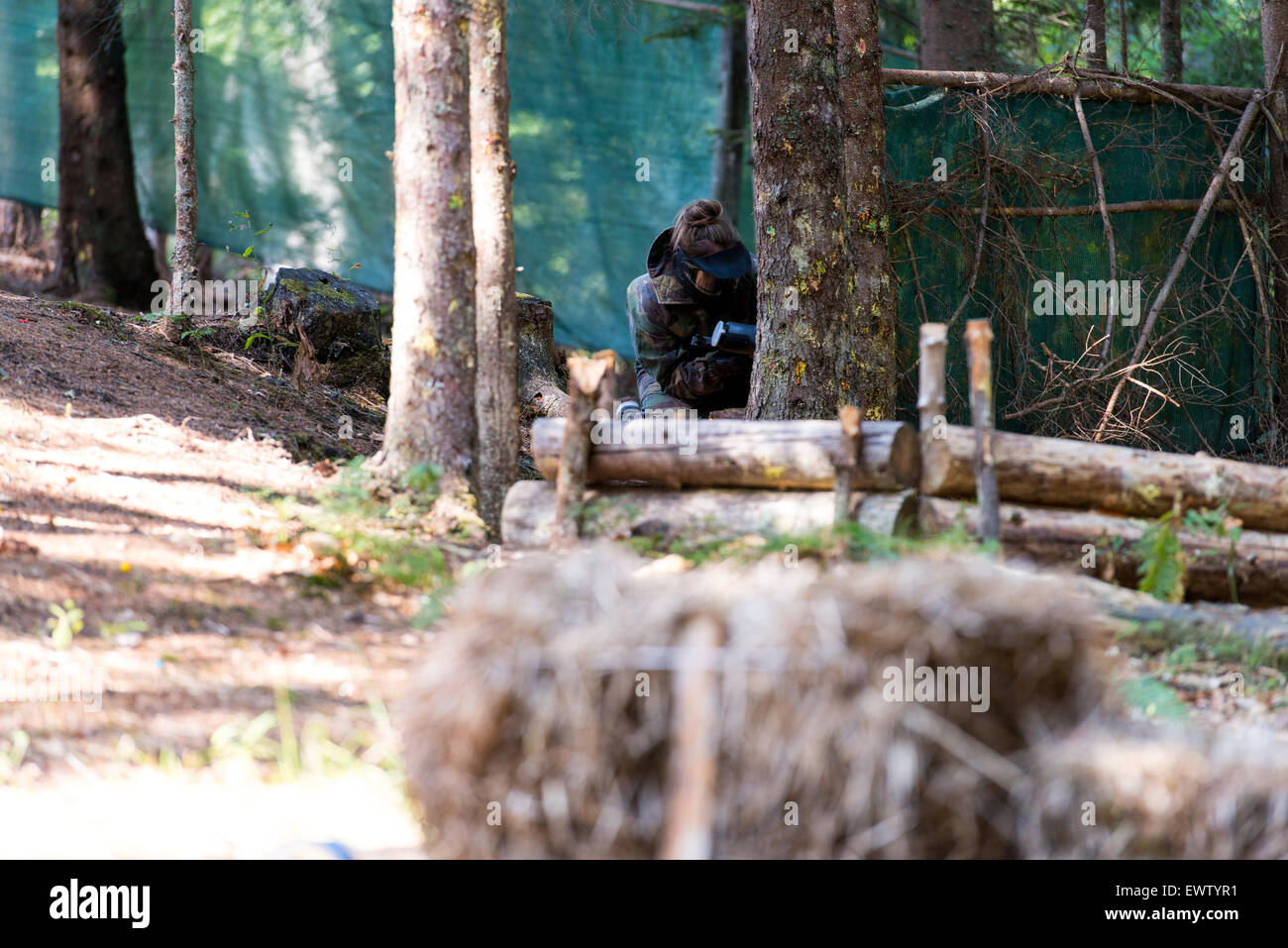 Paintball player Lying Down Stock Photo - Alamy
