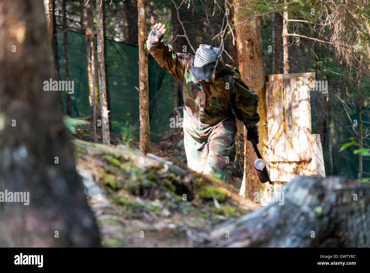 Paintball player lost his game Stock Photo - Alamy