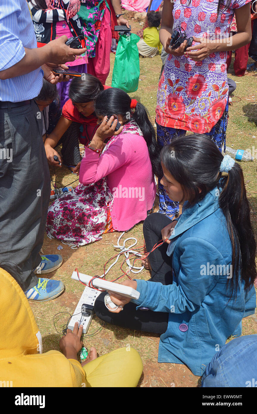 The people of Chautara and surrounding areas charging their mobile ...