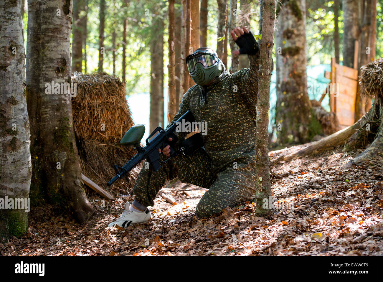 Paintball player wearing protecting mask Stock Photo - Alamy