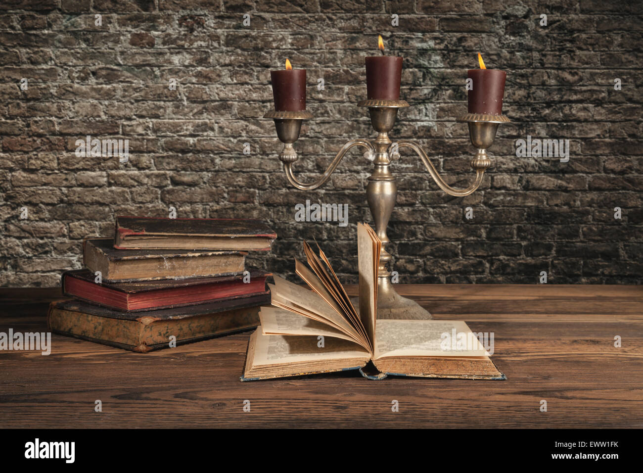 Old books candles hi-res stock photography and images - Alamy