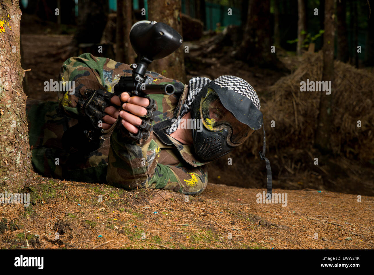 Players in paintball prepare for fight Stock Photo - Alamy