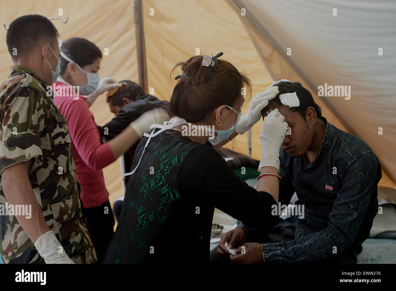 A patient receives follow up treatment at Chautara local Hospital in ...