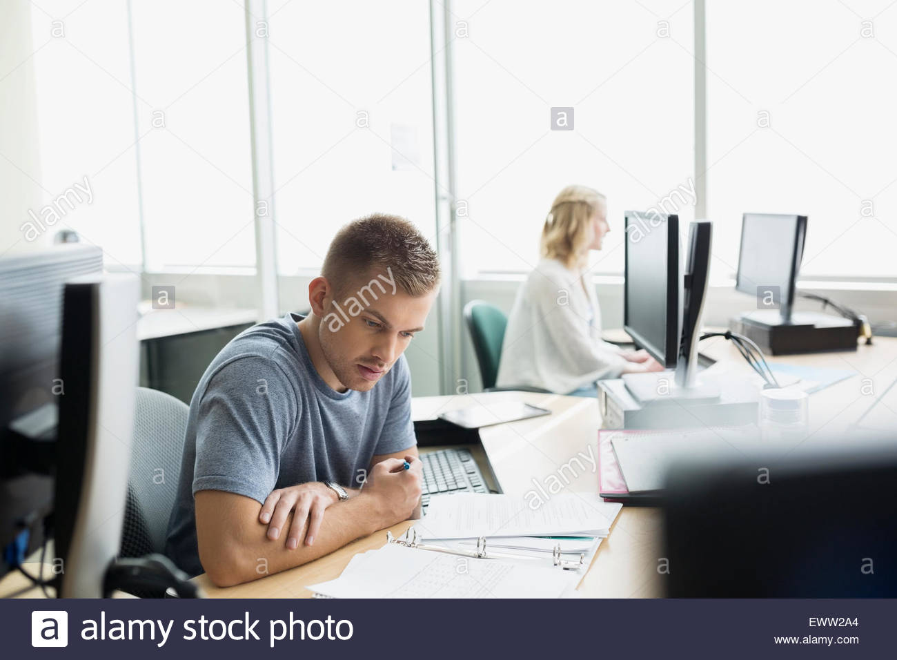 students with computers studying at school Stock Photo - Alamy