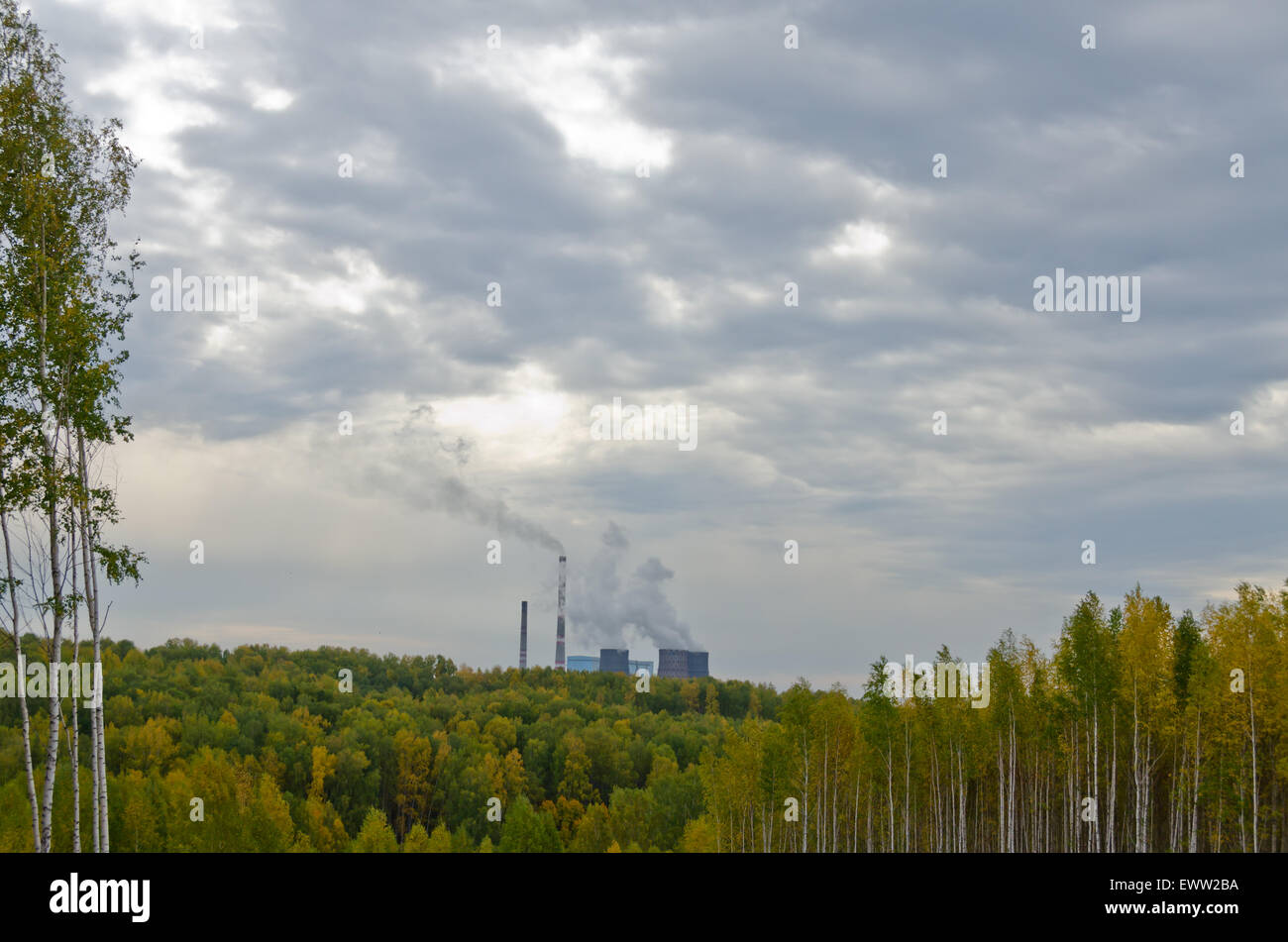 Coal power station behind fall forest Stock Photo - Alamy