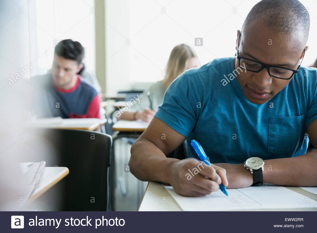 College Students Taking Exam Stock Photos & College Students Taking ...