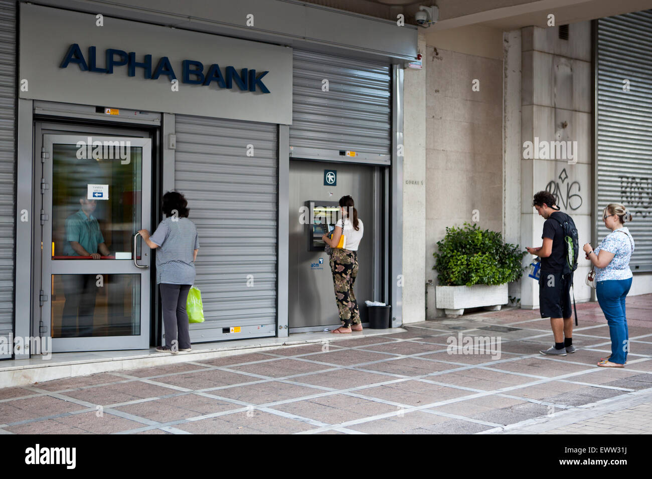 Athens, Greece. 01st July, 2015. Alpha Bank queues amid the Bank ...