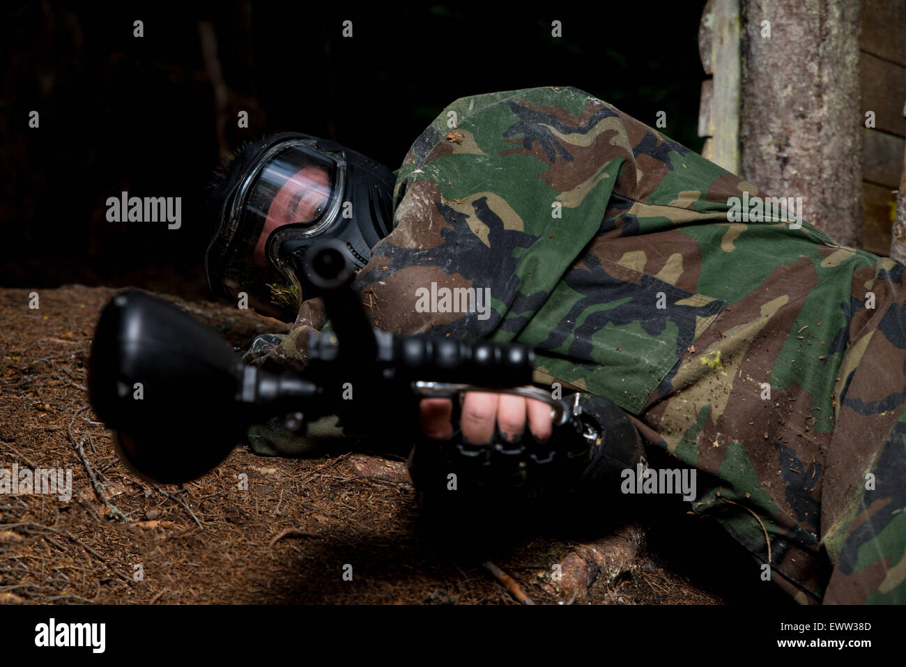 Players in paintball prepare for fight Stock Photo - Alamy