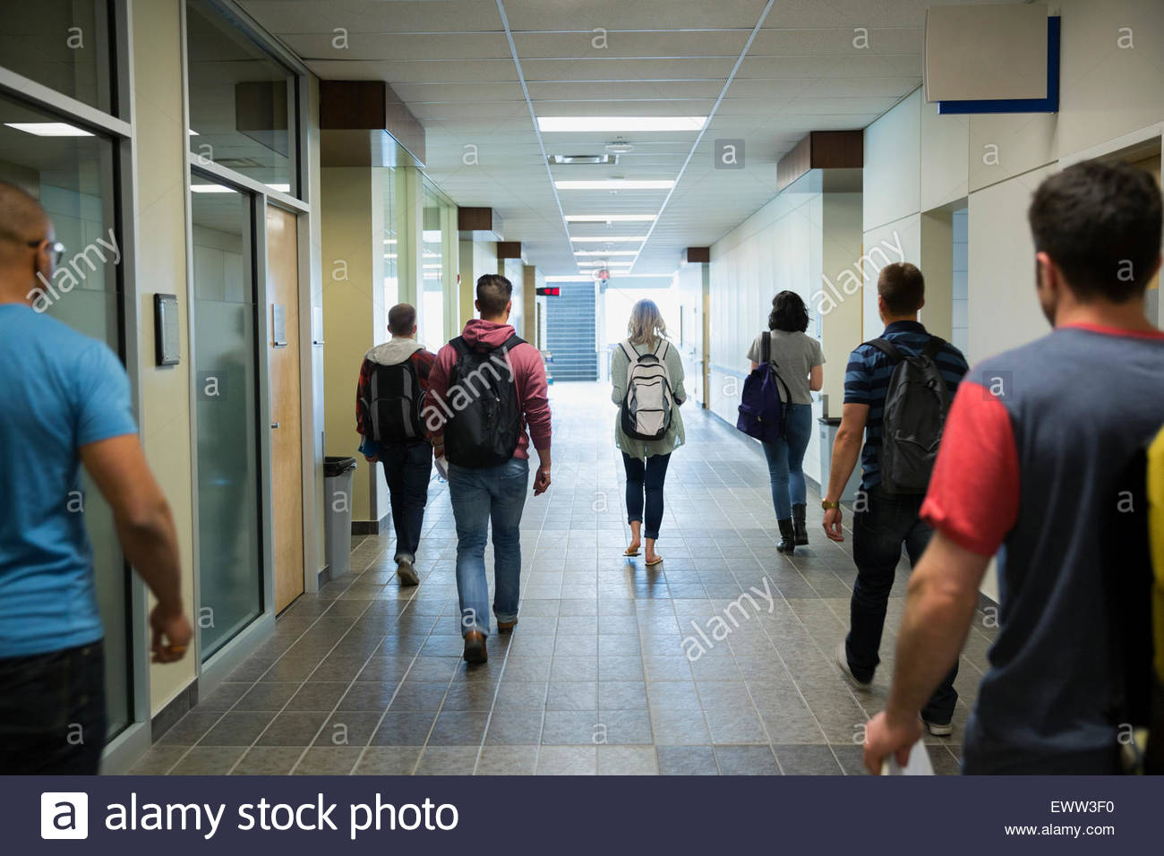 Man walking down corridor hi-res stock photography and images - Alamy
