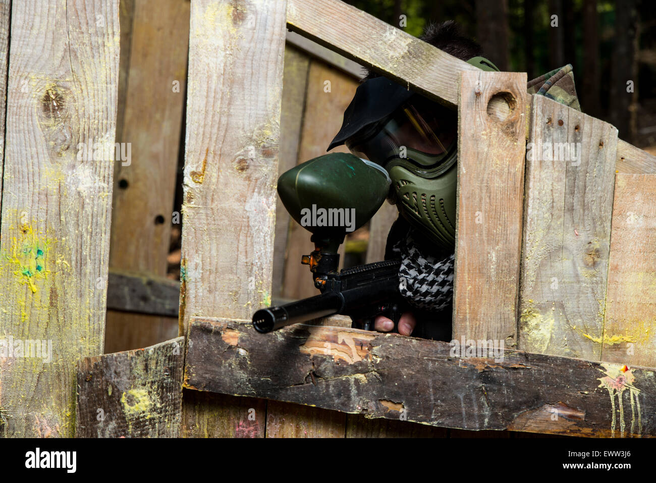 Players in paintball prepare for fight Stock Photo - Alamy