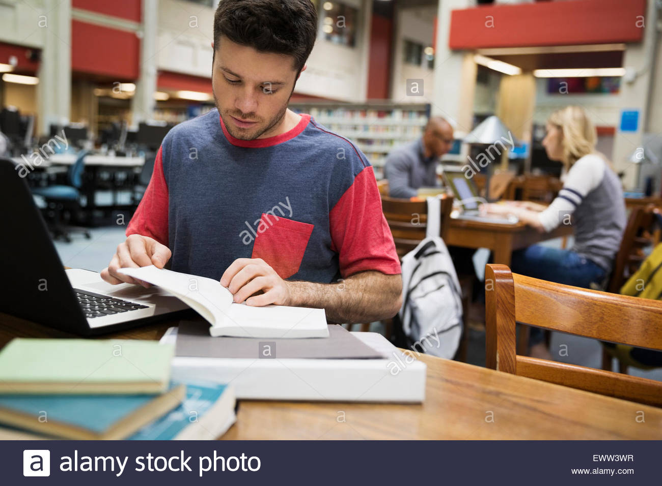 Student studying book hi-res stock photography and images - Alamy