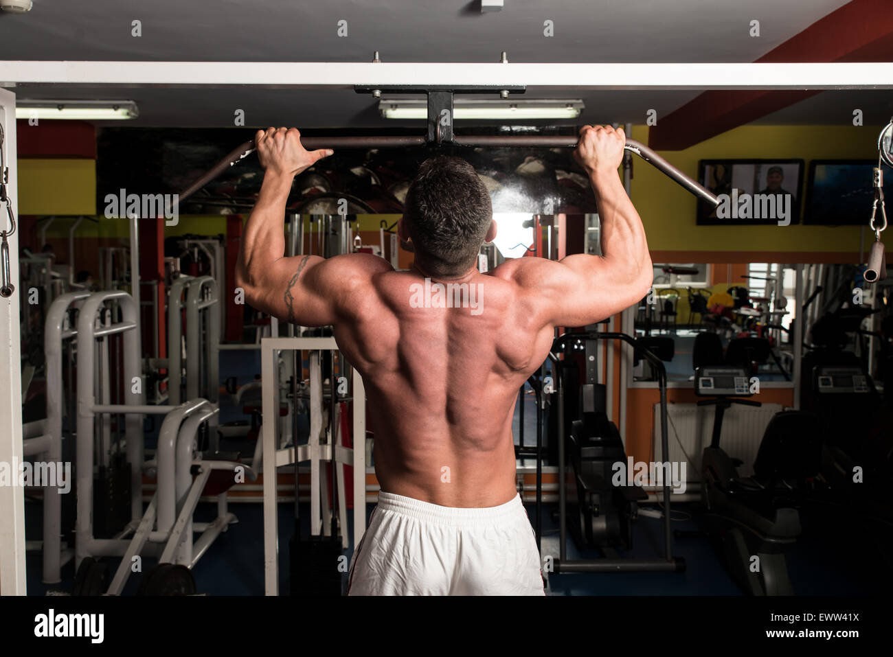Man working out in a gym Stock Photo - Alamy