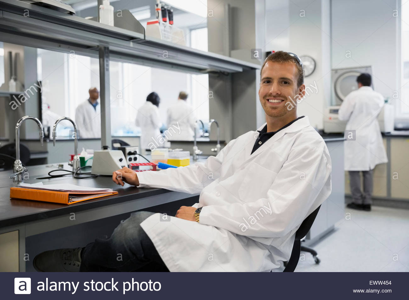 Scientist smiling in laboratory hi-res stock photography and images - Alamy