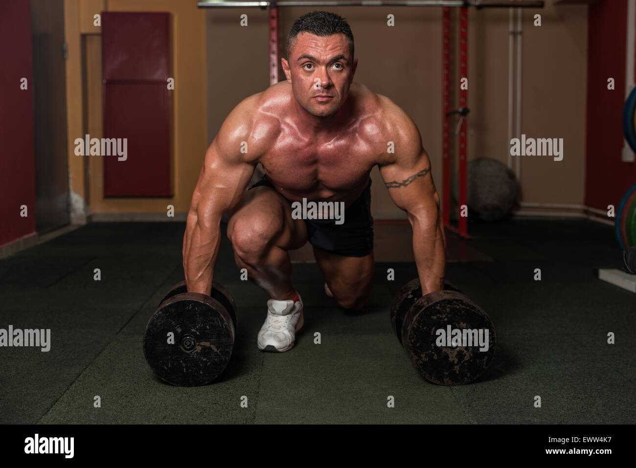 Holding up heavy weight hi-res stock photography and images - Alamy