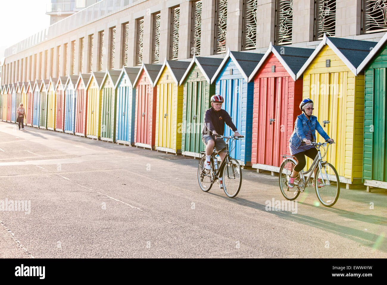 sunny Spring day colourful beach huts next to Boscombe Pier in Boscombe ...