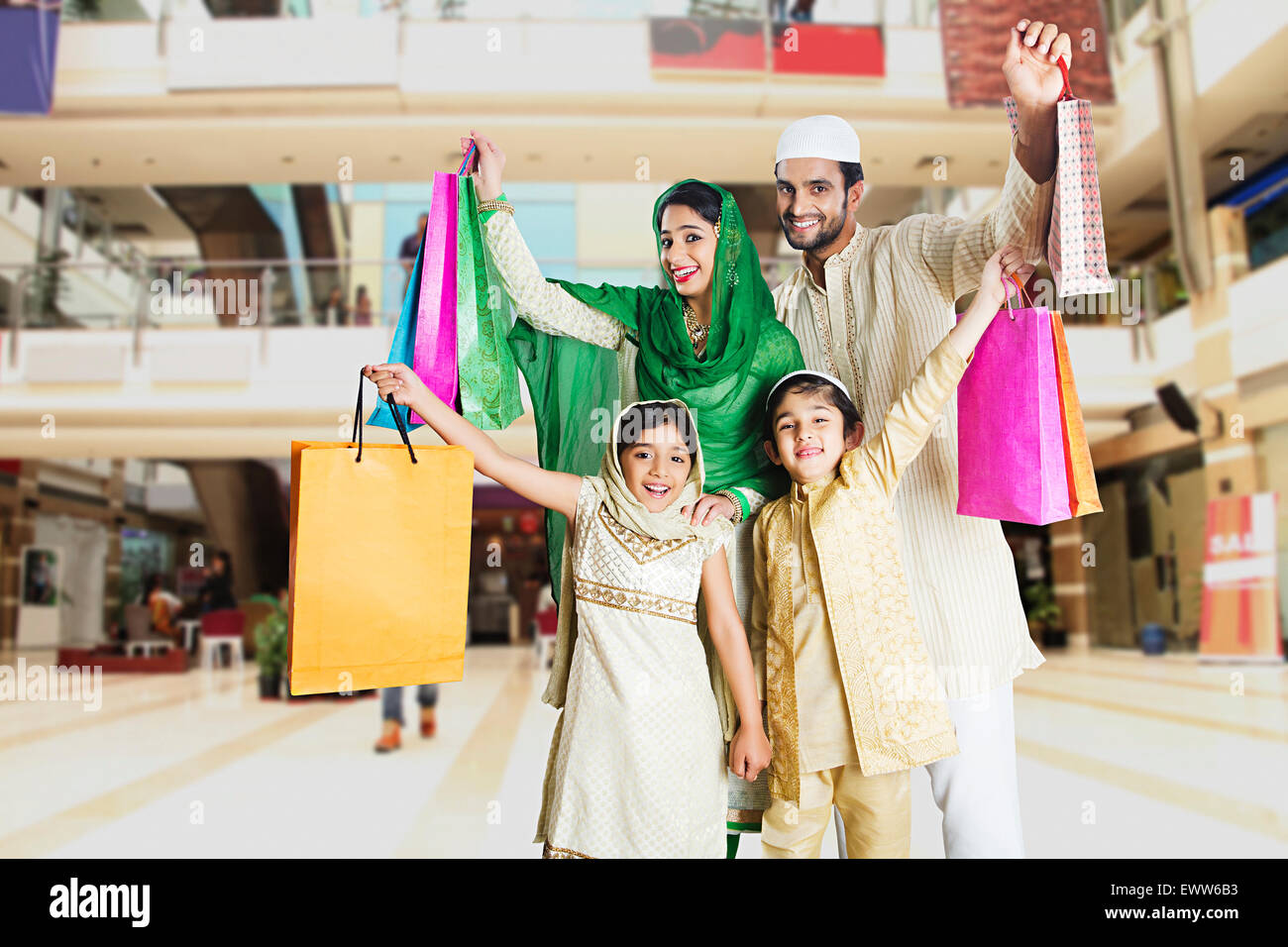 indian Muslim Parents and kids mall shopping Stock Photo - Alamy