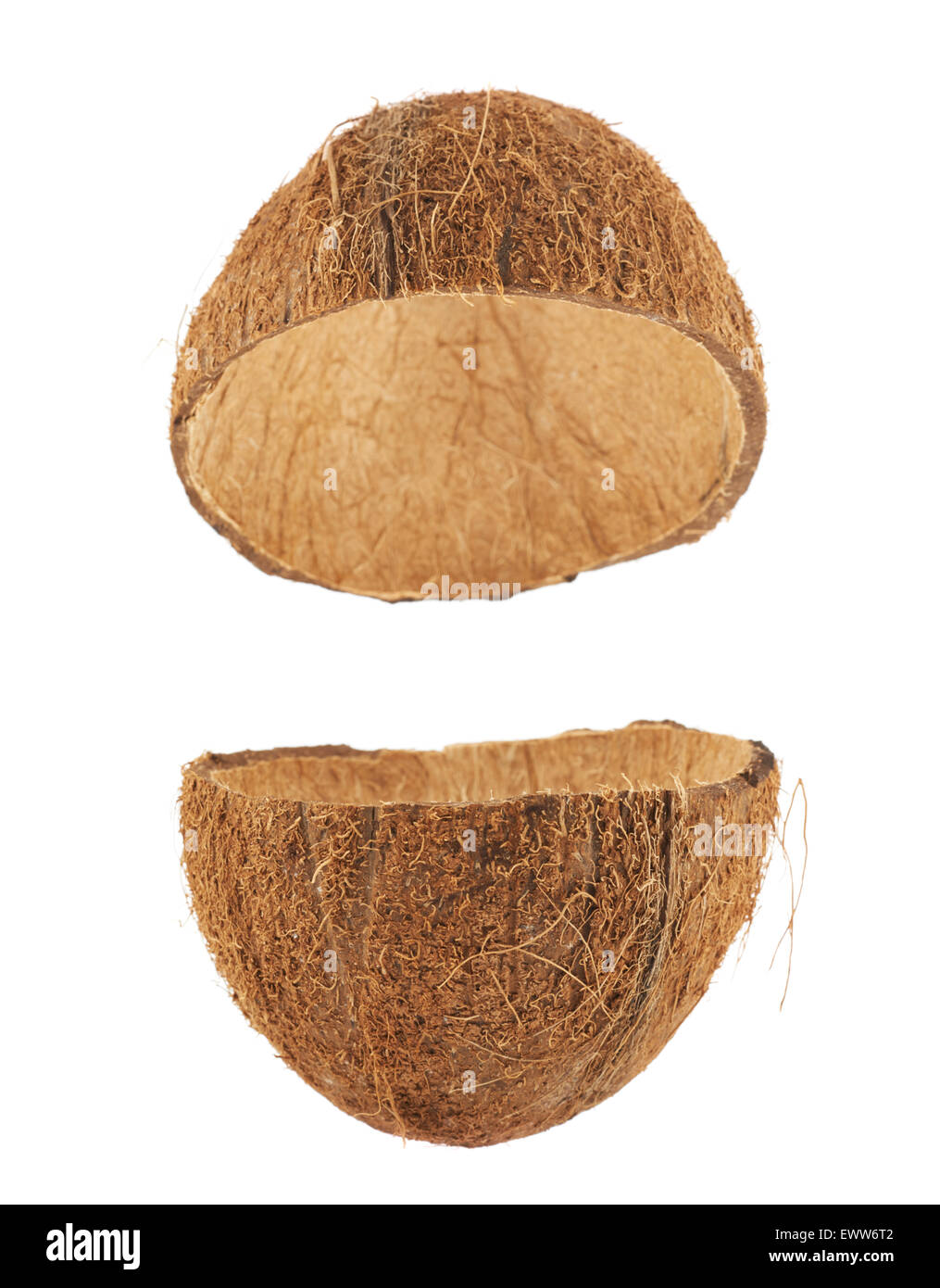 Coconut fruit shell cut in half Stock Photo - Alamy