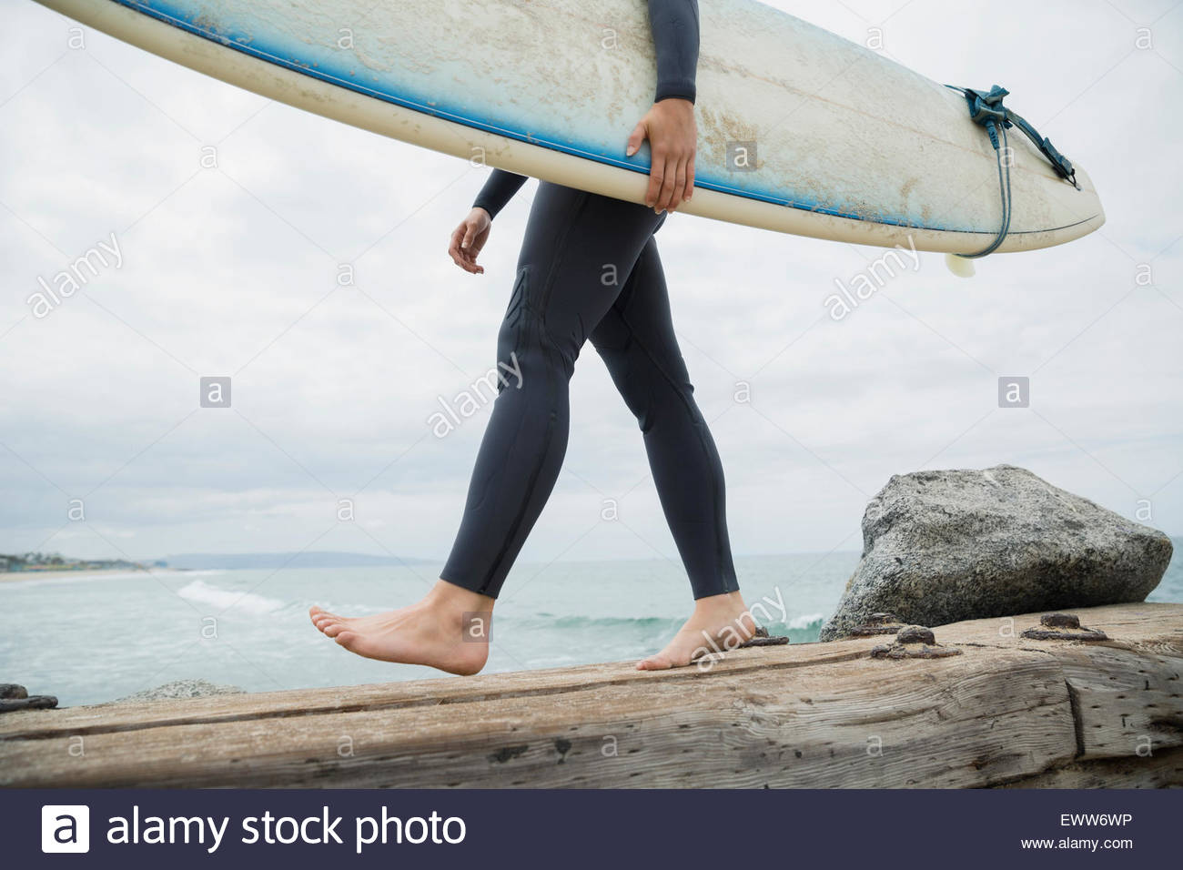 Walking surfer hi-res stock photography and images - Alamy
