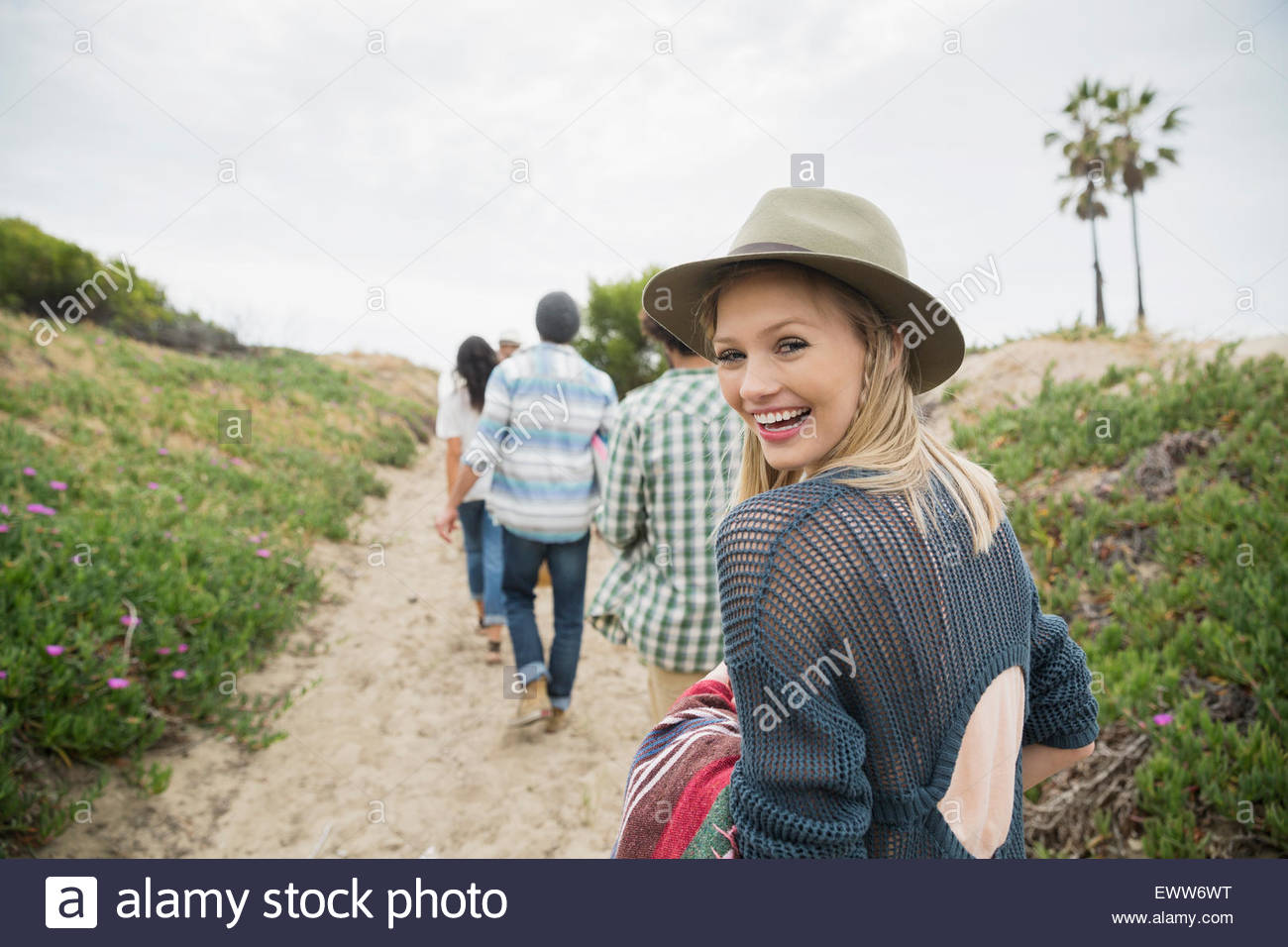 Mid adult woman fun beach hi-res stock photography and images - Alamy