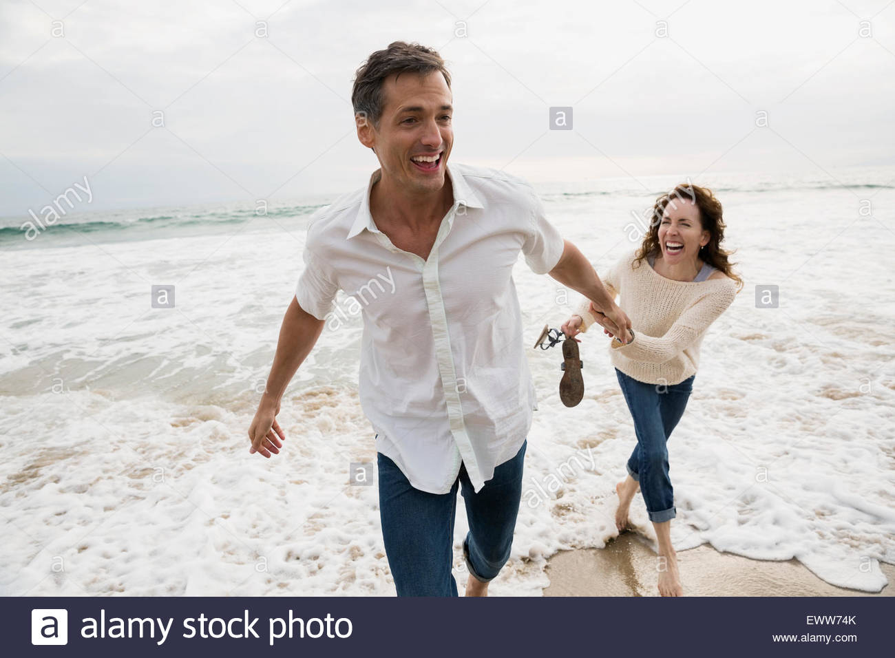 Surf wading hi-res stock photography and images - Alamy