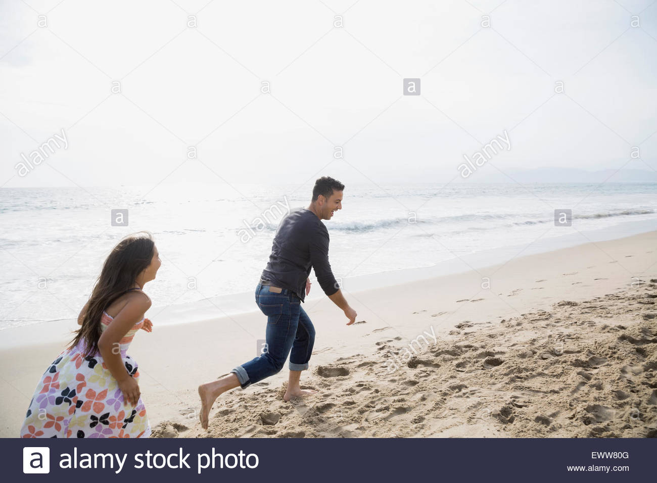 Family chasing people side hi-res stock photography and images - Alamy