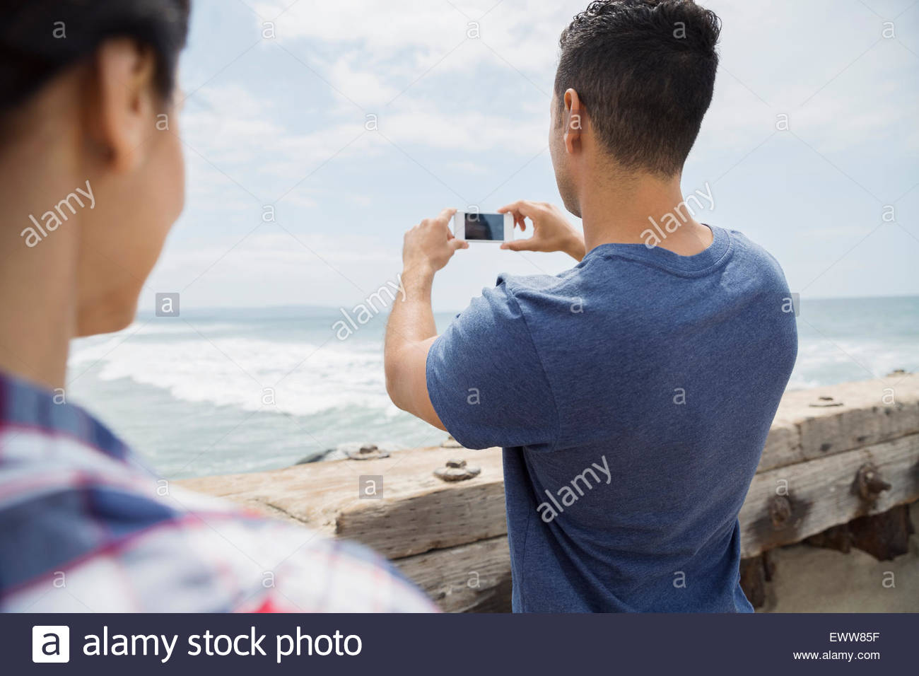 Rear view man photographing nature hi-res stock photography and images ...