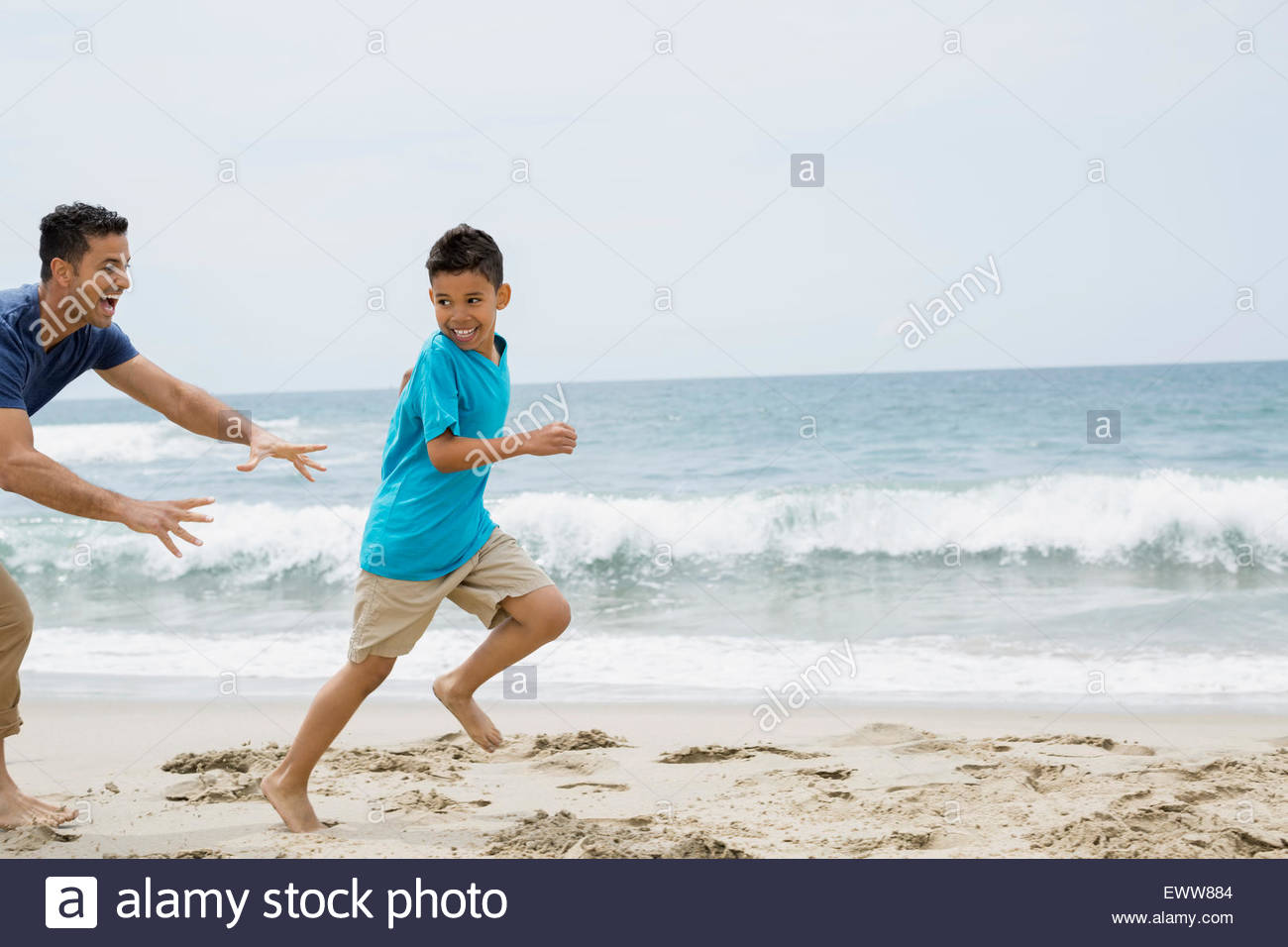 Man running looking over shoulder hi-res stock photography and images ...