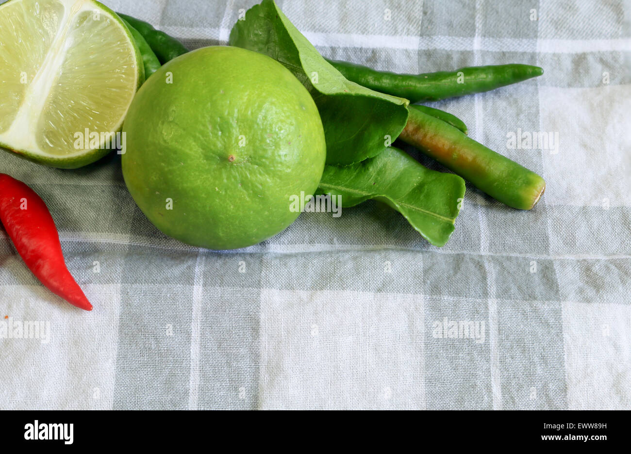 the vegetable background Lemon leaf,Chili,Lime on the handkerchief ...