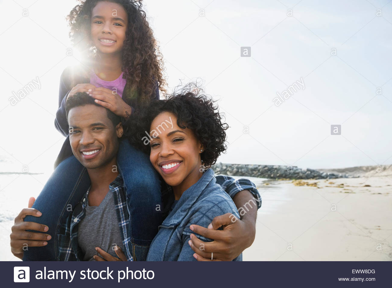 Family on the beach hi-res stock photography and images - Alamy