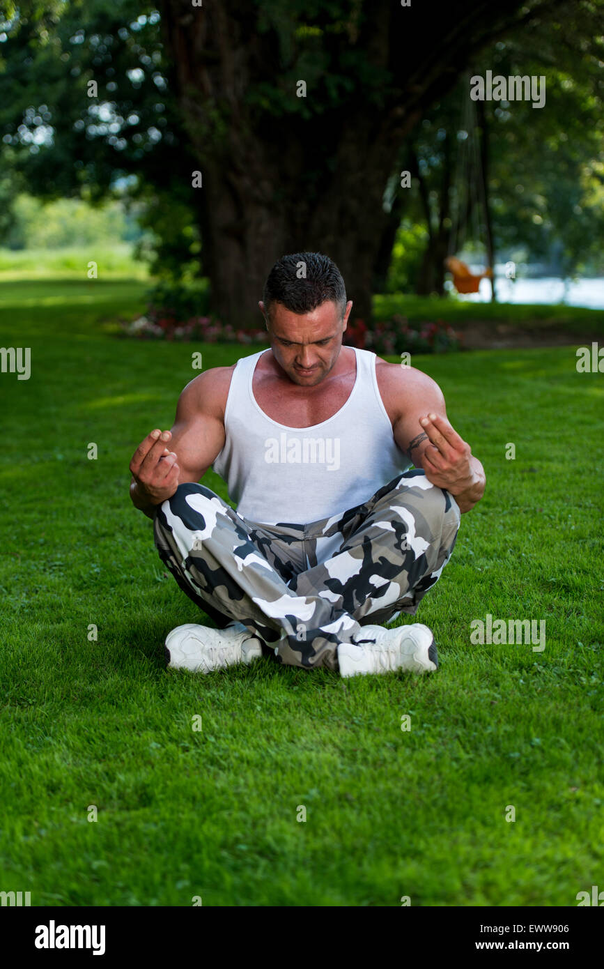 Man Doing Yoga Stock Photo - Alamy