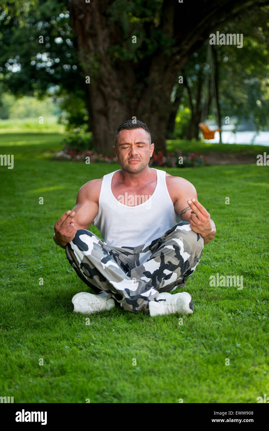 One green human meditating hi-res stock photography and images - Alamy
