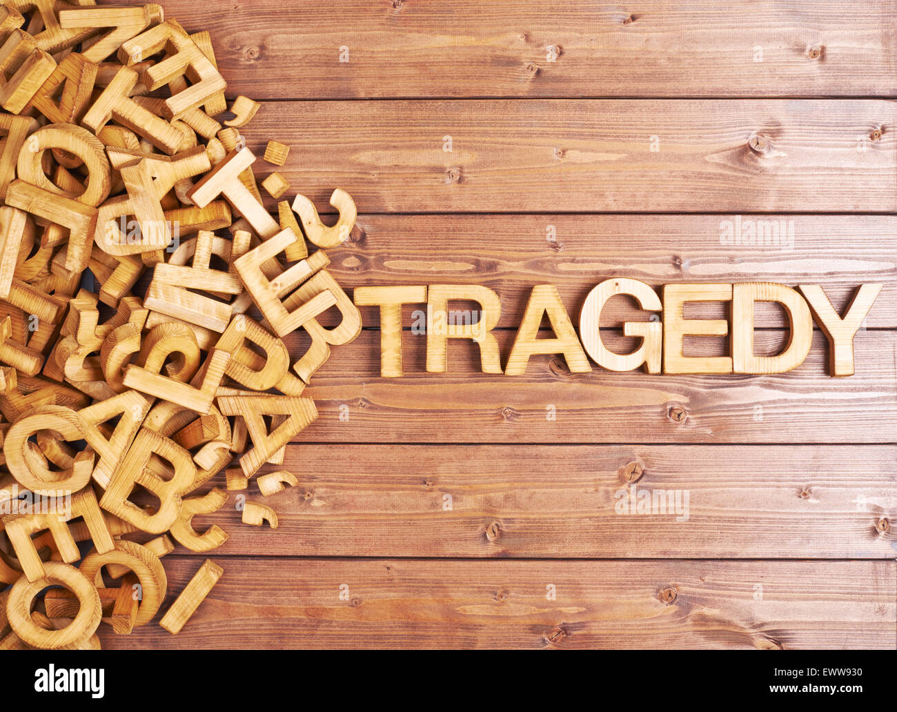 Word tragedy made with wooden letters Stock Photo - Alamy
