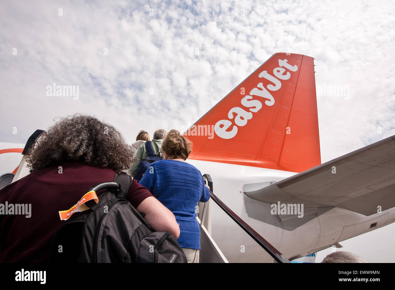 Tourists boarding Easyjet plane at Bournemoth Airport, Dorset, England ...