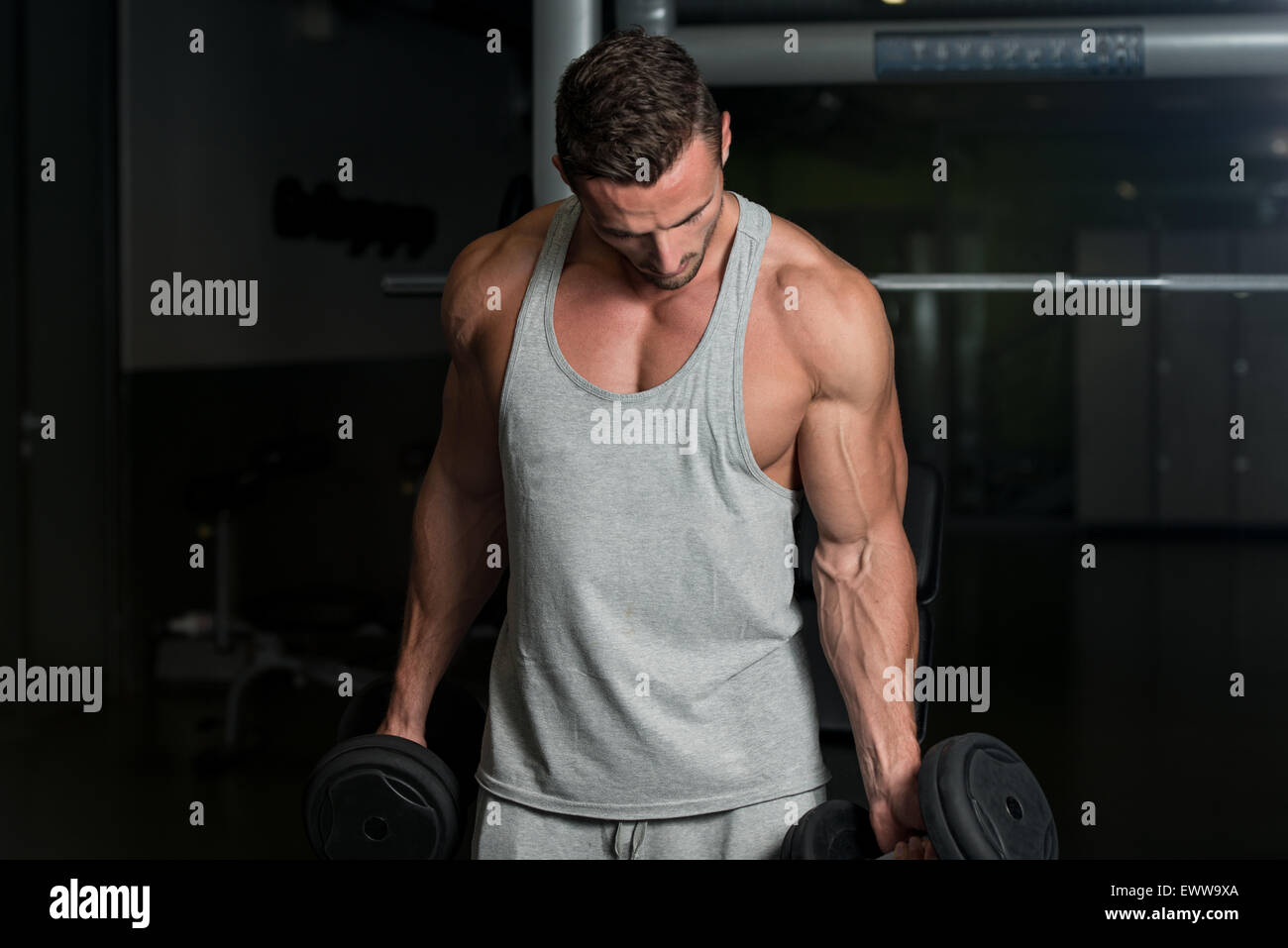 Muscular man lifting hi-res stock photography and images - Alamy