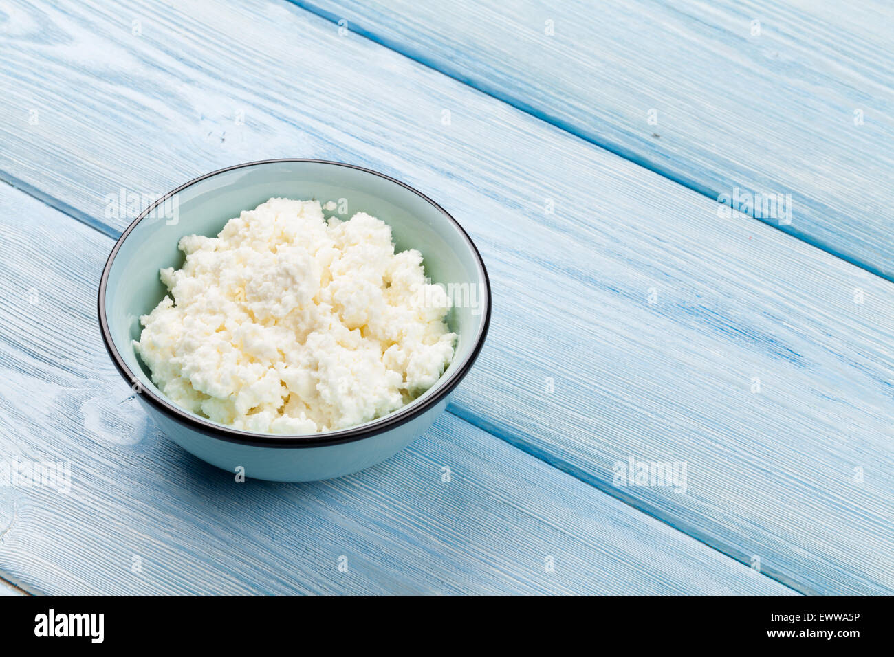 Dairy products on wooden table. Homemade cheese curd. Top view with ...
