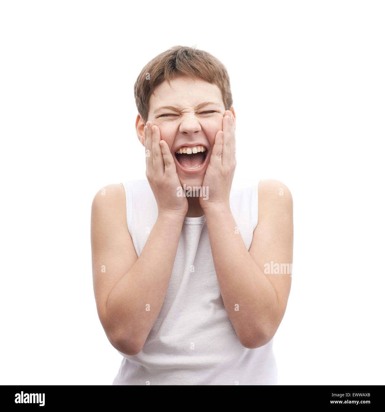 Screaming young boy in a sleeveless shirt Stock Photo - Alamy